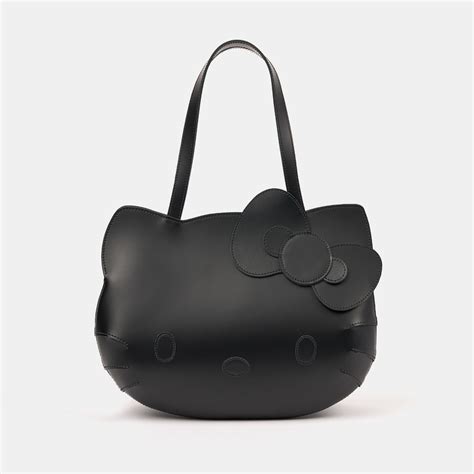Hello Kitty Face Leather Tote Bag In Black Cambridge Satchel