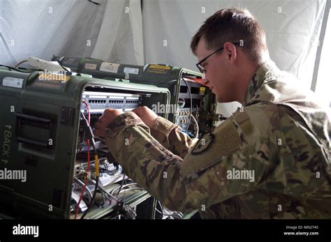 A Signal Soldier Assigned To The 29th Brigade Engineer Battalion 3rd