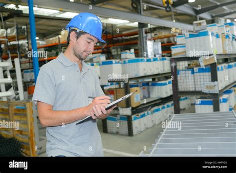 Product Inspector Writing A Report Stock Photo Alamy