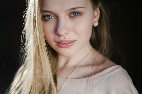 Premium Photo Blonde White Girl On Black
