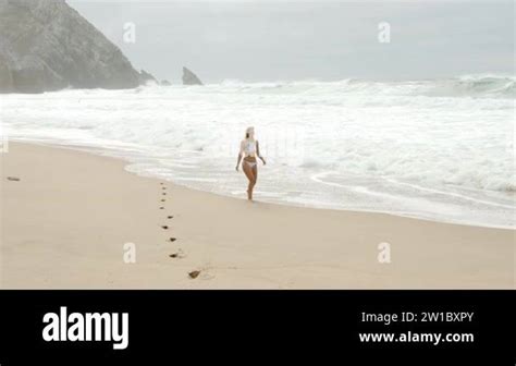 Sexy Girl Wearing A Bikini At The Beach Summer Vacation At The Ocean
