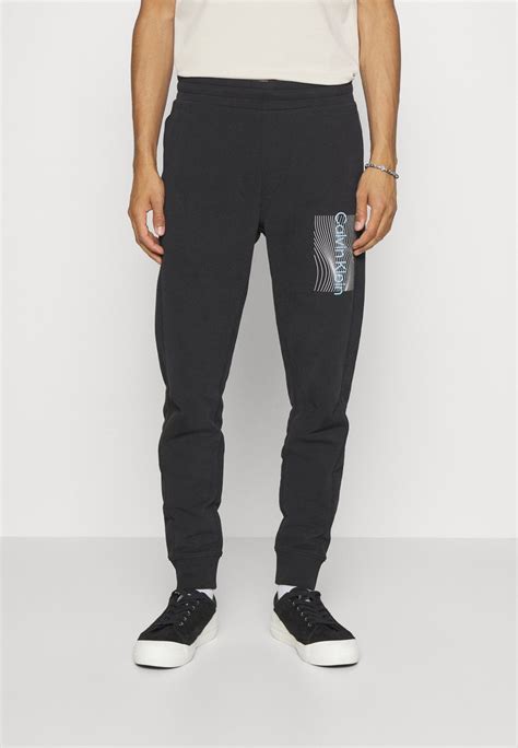 Calvin Klein Wave Lines Pants Verryttelyhousut Black Musta Zalando Fi