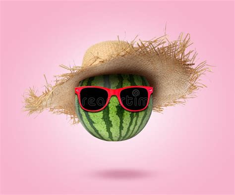 Watermelon With Straw Hat And Sunglasses On Pink Background Stock Image