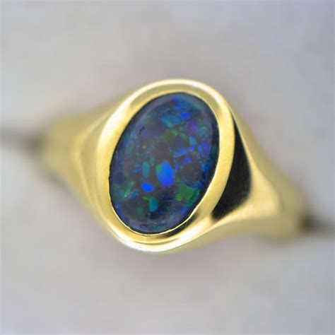Vintage British Gents Ring With Peacock Hued Black Opal Exquisite Jewelry For Every Occasion