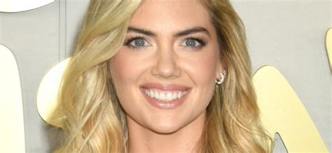 Kate Upton Shows Off Her Bombshells In Plunging Dinner Dress