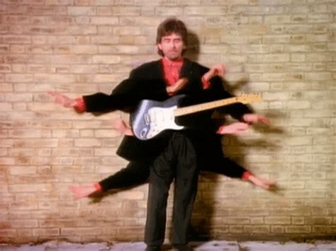 George Harrison Tocando Guitarra  856 Beatles Guitar Royalty Free