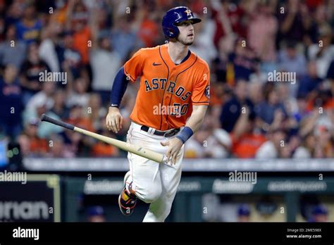 Houston Astros Kyle Tucker 30 Flips His Bat As He Rounds The Bases