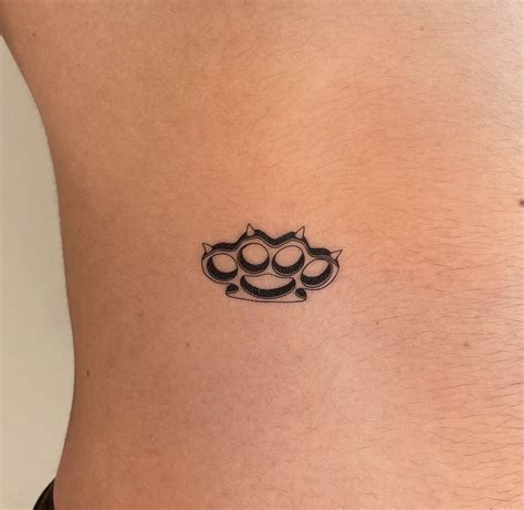 Girly Brass Knuckles Tattoo
