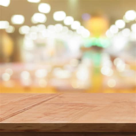 Premium Photo Table Top With Blur Bokeh Effect