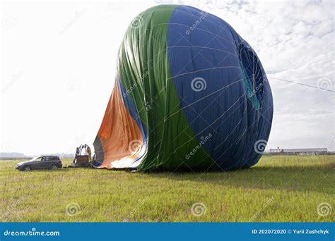 Hot Air Balloon Getting Ready For Launching Car And Trailer With