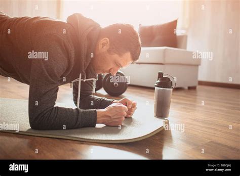 Young Ordinary Man Go In For Sport At Home Cut View Of Amateur