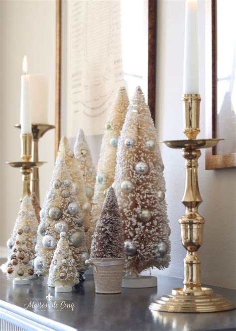 Holiday Table Setting With Cedar Eucalyptus And Brass Bells Holiday