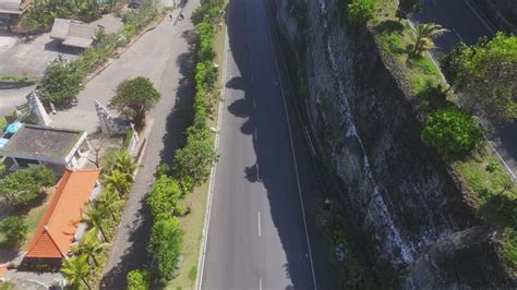 Aerial View Of Limestone Road Cutting And Cliff Wall At Melasti Beach Bali 72189209 Stock Video