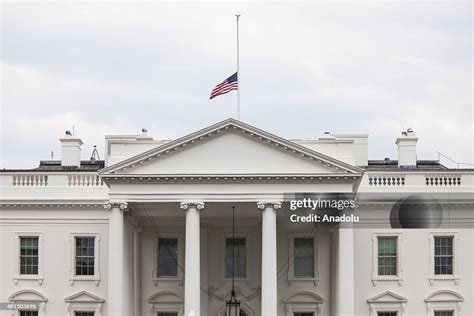 The American Flag Flies Above The White House After President Barack