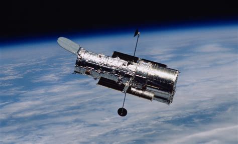 Nasa Telescope Photographs Two Objects In Deep Space Merging Into One