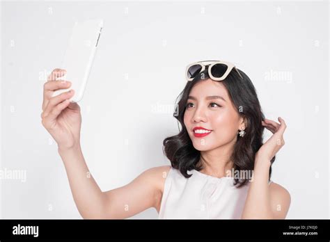 Portrait Of Beautiful Asian Fashionable Girl Taking Selfie Stock Photo Alamy