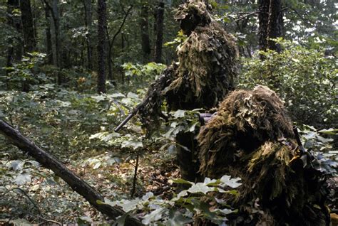 A Marine Sniper Team Wearing Camouflage Ghillie Suits On A — Nara And