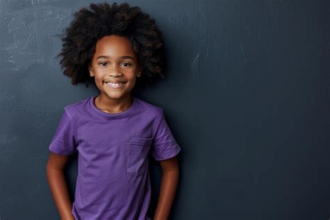 Premium Photo A Young Boy Wearing A Purple Shirt That Says Were In