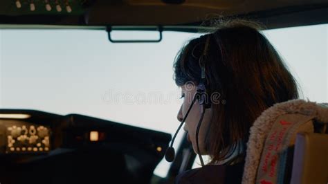 Woman Copilot Using Control Panel Command In Captain Cabin Stock Video Video Of Engine