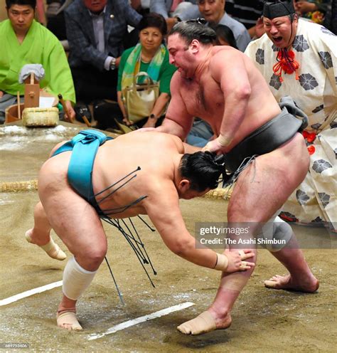 Georgian Wrestler Tochinoshin Throws Mongolian Sekiwake Tamawashi To