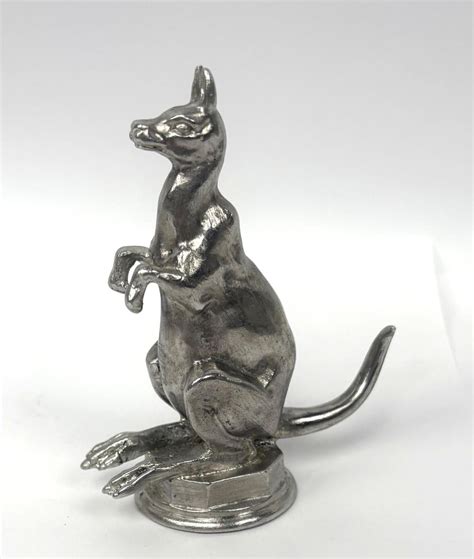 Lot A Vintage White Metal Kangaroo Form Car Hood Ornament