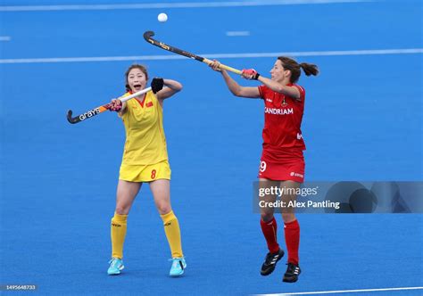 Emily White Of Belgium Controls The Ball Ahead Of Yangyan Gu Of China