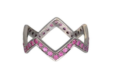 Lot 214 A Ruby Shaped Band Ring In Zig Zag Form