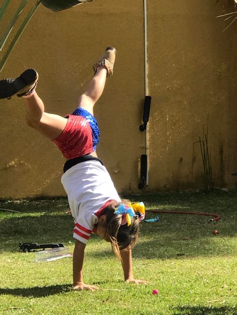 Premium Photo Rear View Of Boy Playing Soccer
