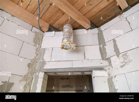 Installation Of A Pipe Heating System Heating At Home With Hot Air Laying And Fixing Isolated