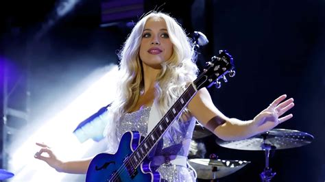 Download Megan Moroney Live Performance Wallpaper