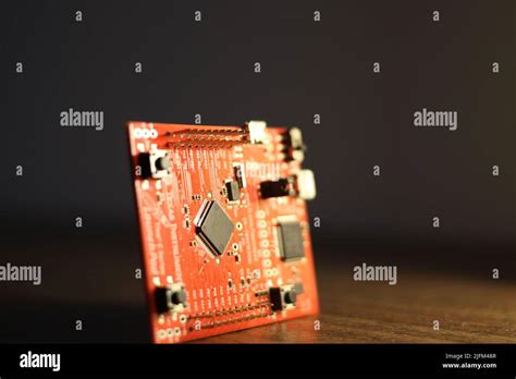 A Surface Mounted Semiconductor Chip On A Microcontroller Pcb Stock