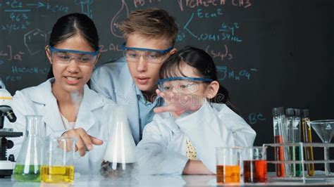 Cute Girl Looking At Beaker While Doing Experiment In Stem Class Edification Stock Video