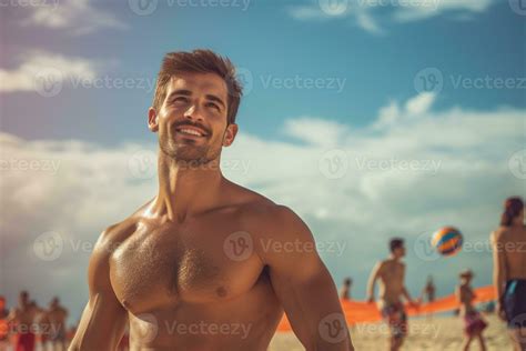 Male Beach Volleyball Players Play A Volleyball Match On The Beach