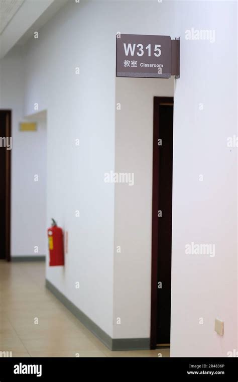 Bilingual English And Chinese Classroom Sign Above Entrance To Room At