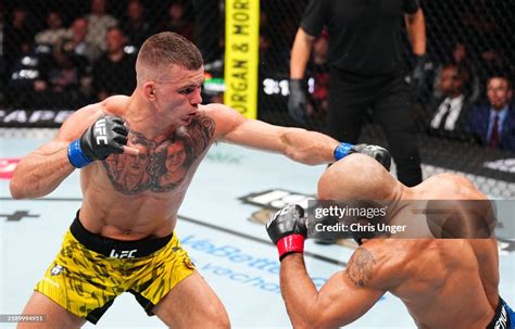 Felipe Lima Of Brazil Punches Miles Johns In A Featherweight Fight
