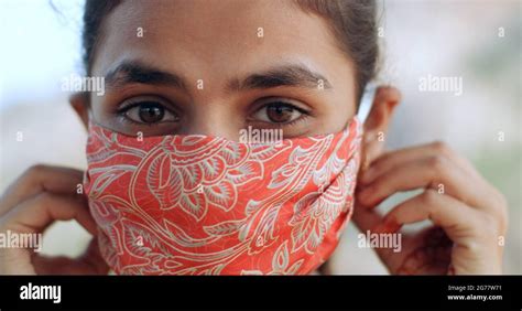 Closeup Shot Of An Indian Girl Wearing A Mask New Normal Concept Stock