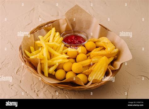Different Types Of Fried Potatoes Such As French Fries Roast Potatoes And Potato Balls Stock
