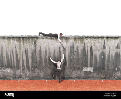 Teamwork Concept Of Assistance A Man Helps Another Person To Climb A