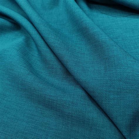 Tessuto Cady Elasticizzato Effetto Melange Tinta Unita Ottanio