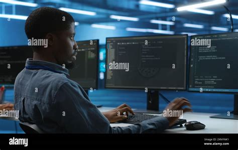 It Specialist In Server Farm Ensuring Valuable Data Remains Shielded