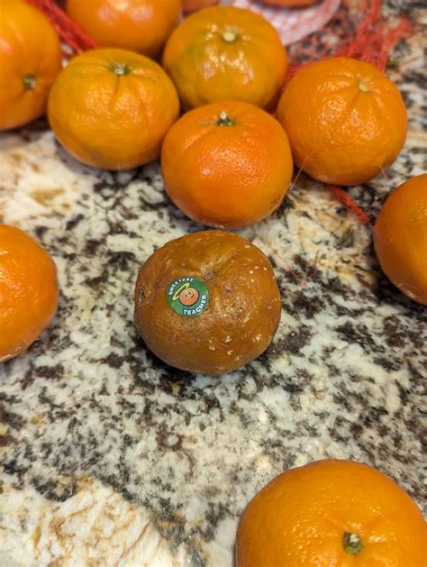 One Of The Manderins In My New Bag Was Rotten With A Sticker That Says