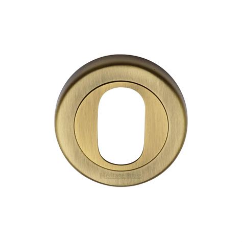 Heritage Brass Oval Profile Cylinder Escutcheon Antique Brass Finish