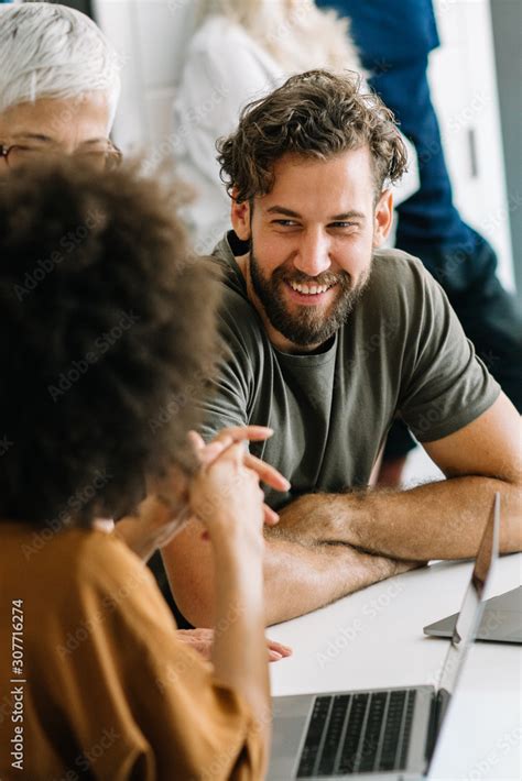 Software Engineers Working On Project Together Stock Photo Adobe Stock