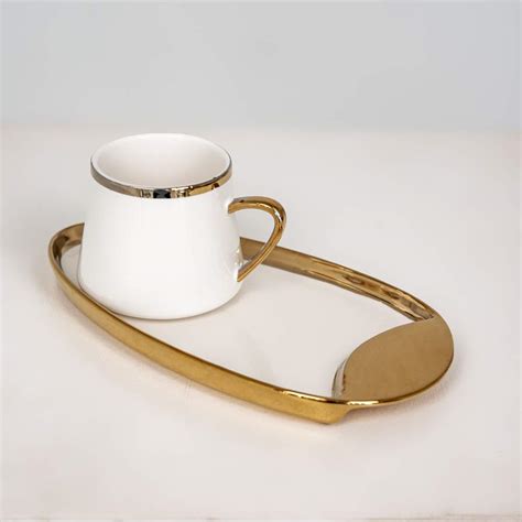 Puodelis Auksinis Akcentas”