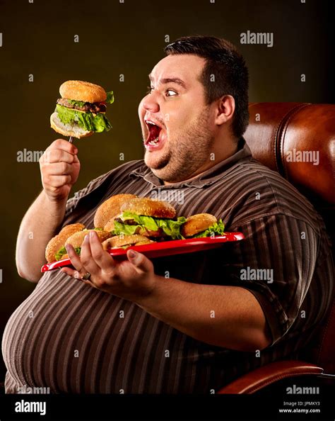 Overweight Man Eating