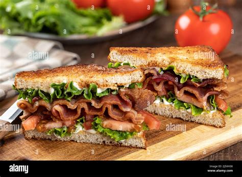 Blt Sandwich Made With Bacon Lettuce And Tomato On Toasted Whole Grain