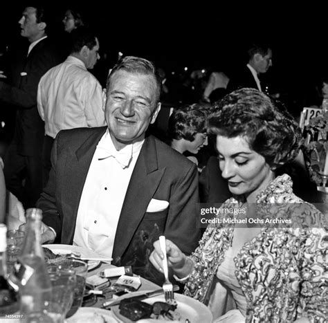 John Wayne And His Wife Pilar At A Nightclub Circa 1961 In Los Photo