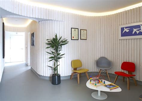 Dublin Dental Practice By Urban Agency Features Curved Wooden Walls
