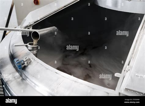 Sampling In The Process Of Brewing Beer At The Beer Production Plant