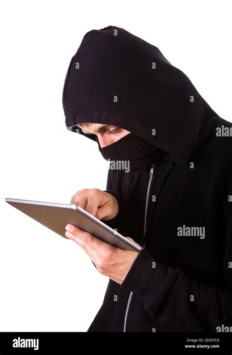 Hacker With A Tablet Computer On The White Background Stock Photo Alamy